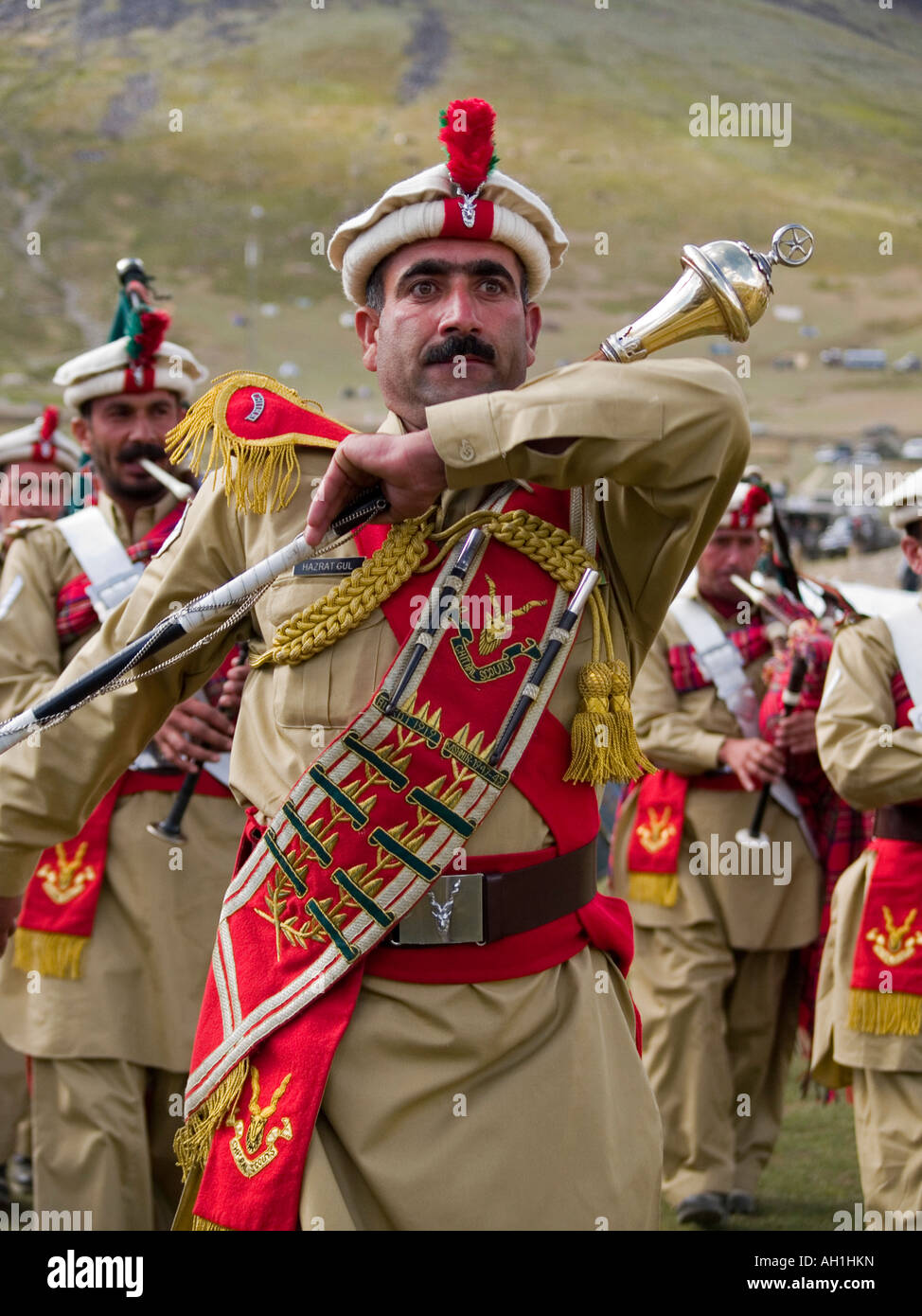 marching band leader stomping along at the Shandur Cup Festival ...