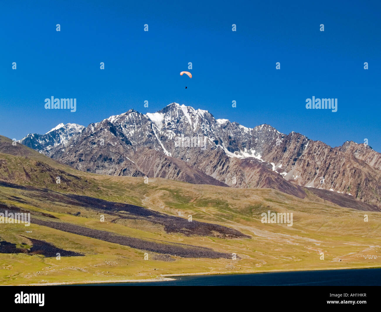 parasailing above the Shandur Pass in the Hindu Kush of Pakistan Stock ...
