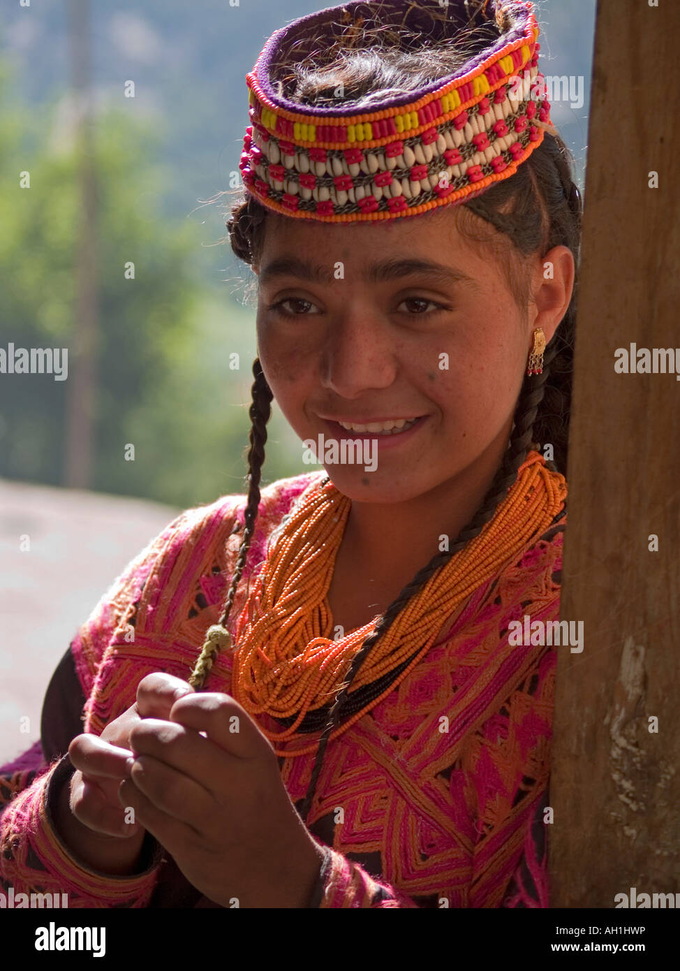 Young Kalasha woman posing Bumburet Pakistan Stock Photo - Alamy