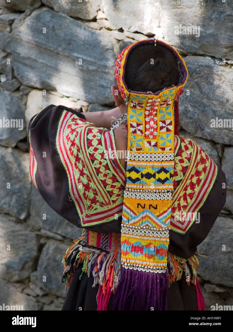 shy Kalasha girl and her traditional headdress, Pakistan Stock Photo ...