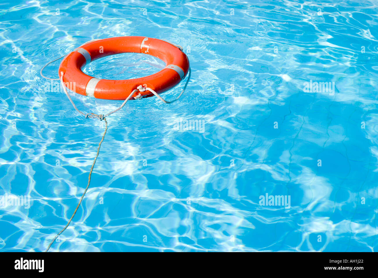 Lifebuoy in a pool Stock Photo - Alamy