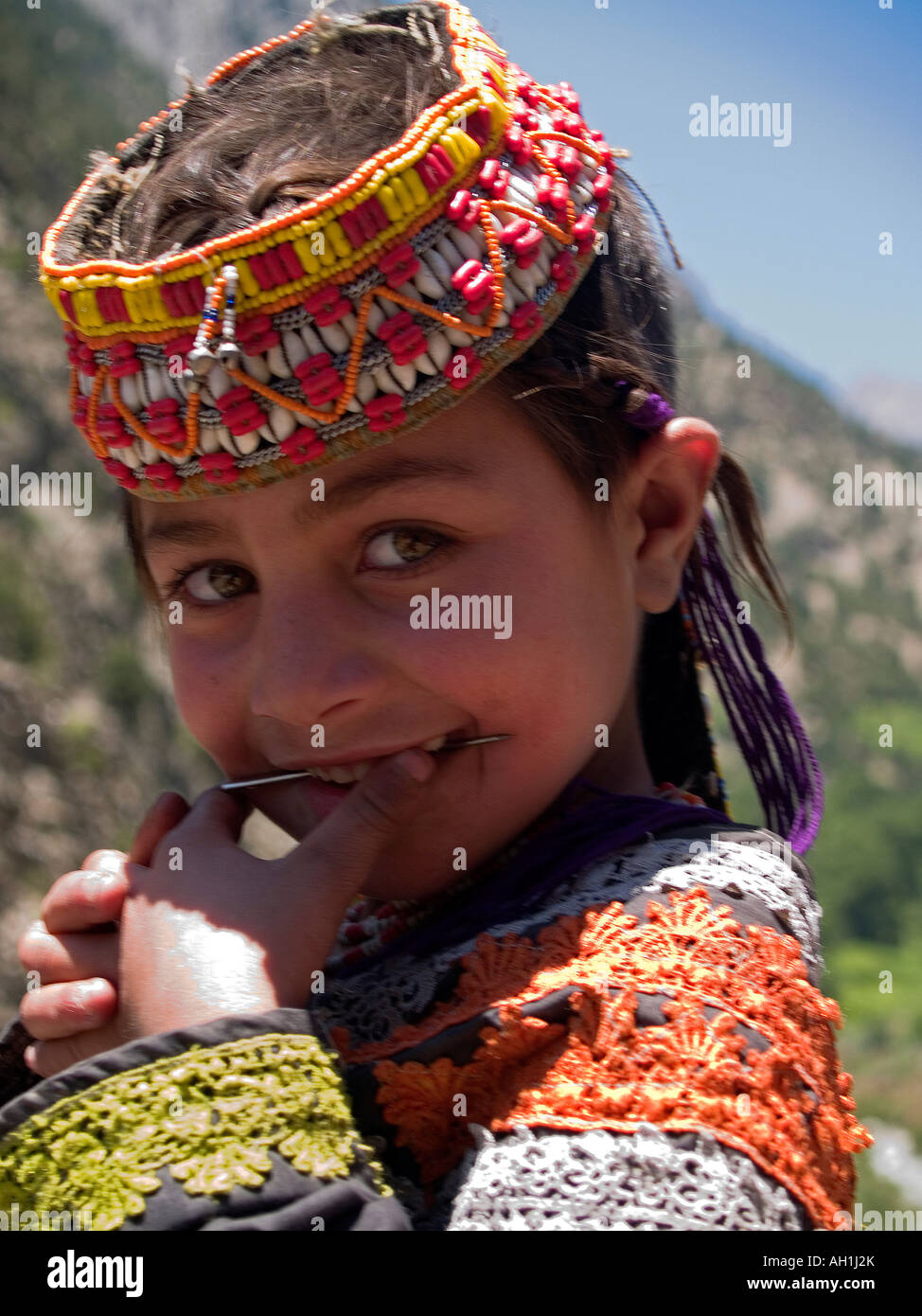 Traditional Kalasha girl smiling, Chitral, Pakistan Stock Photo - Alamy