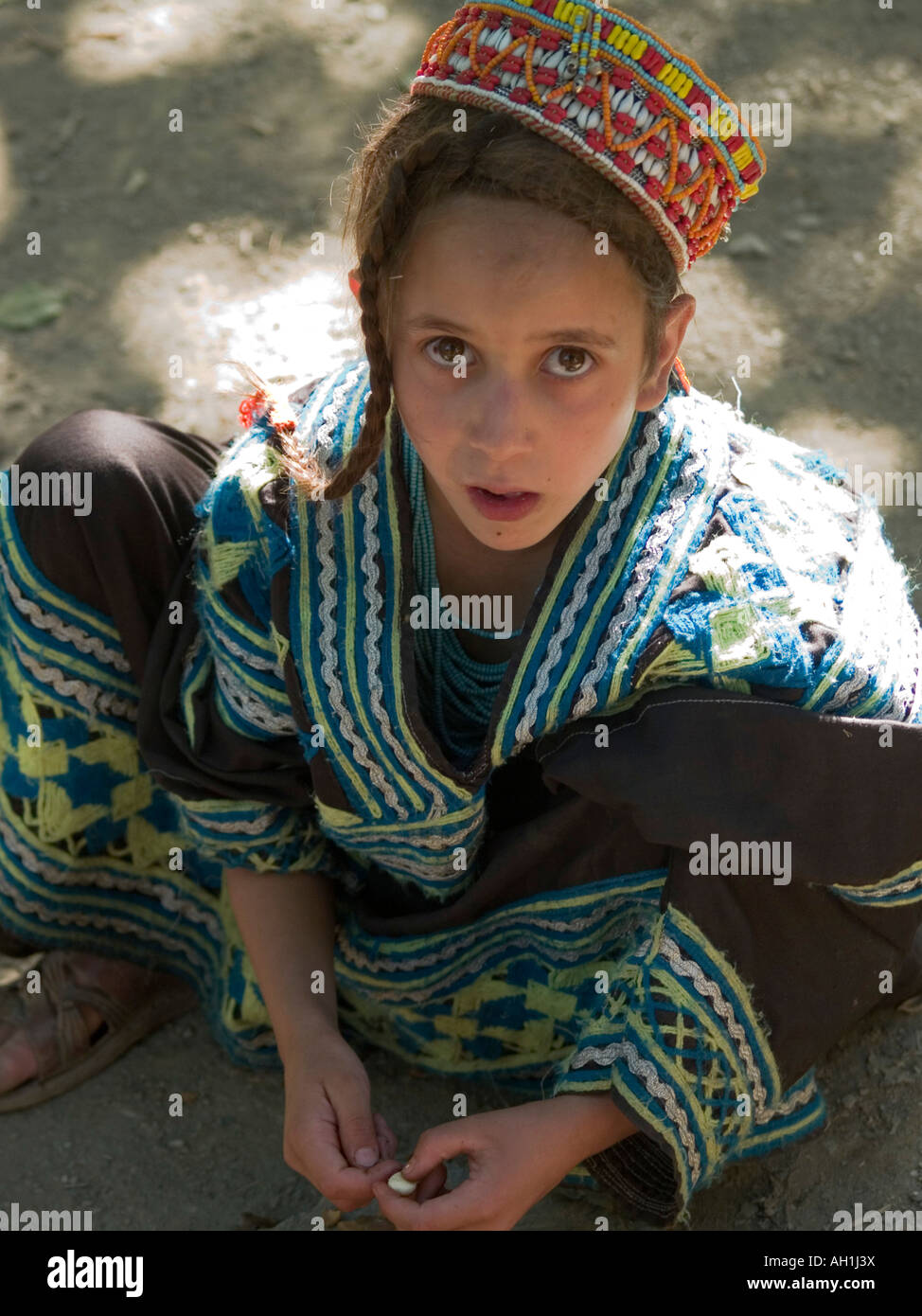 Young Kalasha girl looking up Stock Photo - Alamy