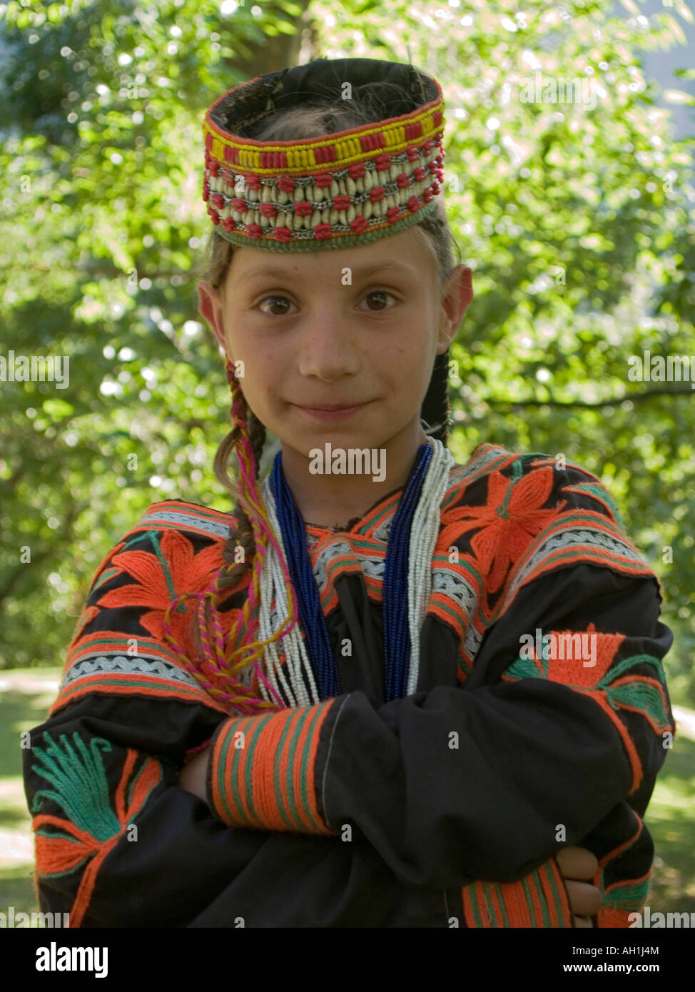 Bold Kalasha girl staring at the camera Stock Photo - Alamy