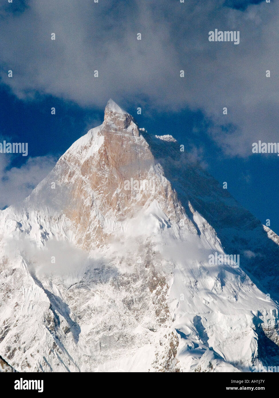Masherbrum Peak in the clouds Karakoram Mountains Pakistan Stock Photo ...