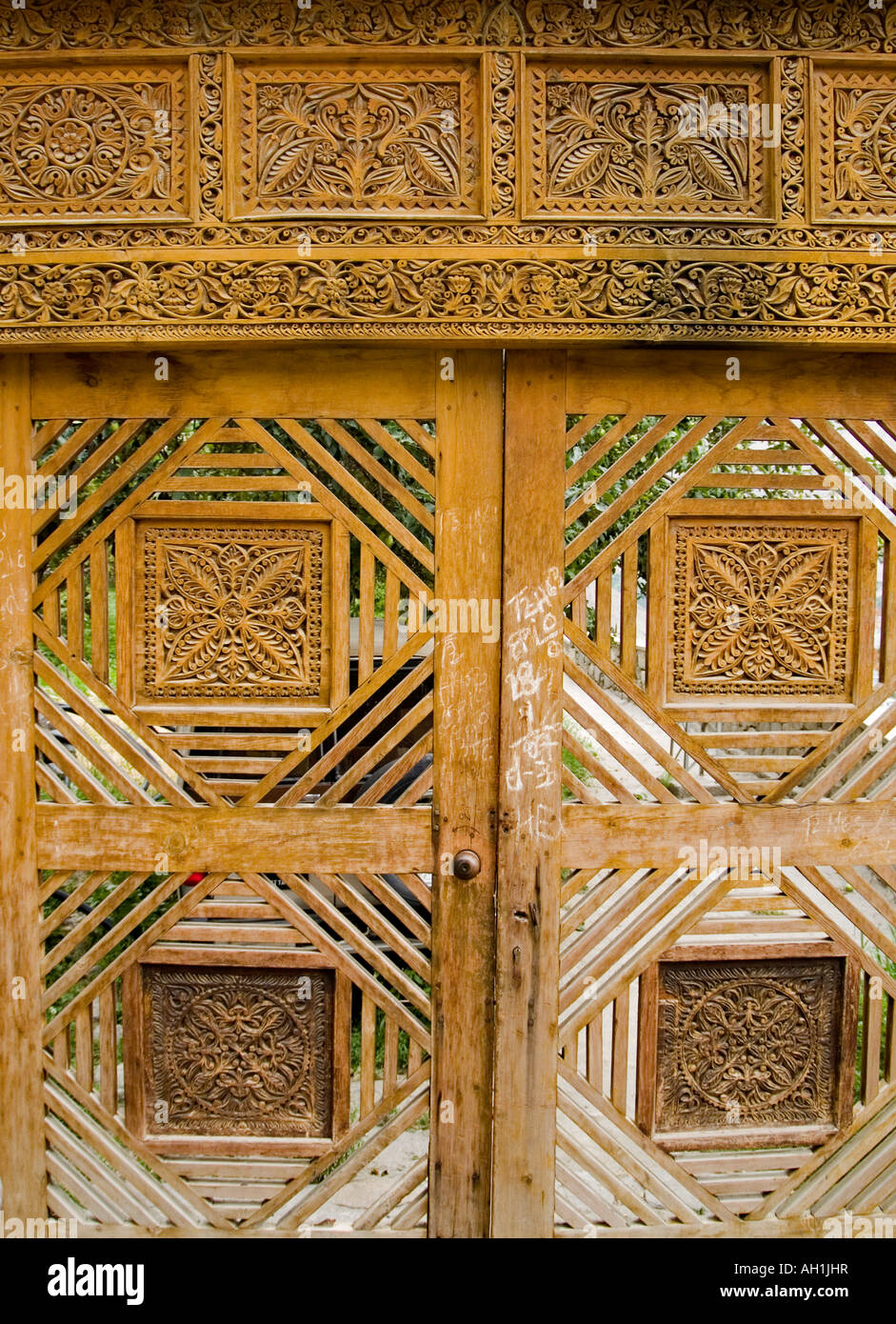 ornate detailed woodwork on a set of doors Hunza Pakistan Stock Photo ...