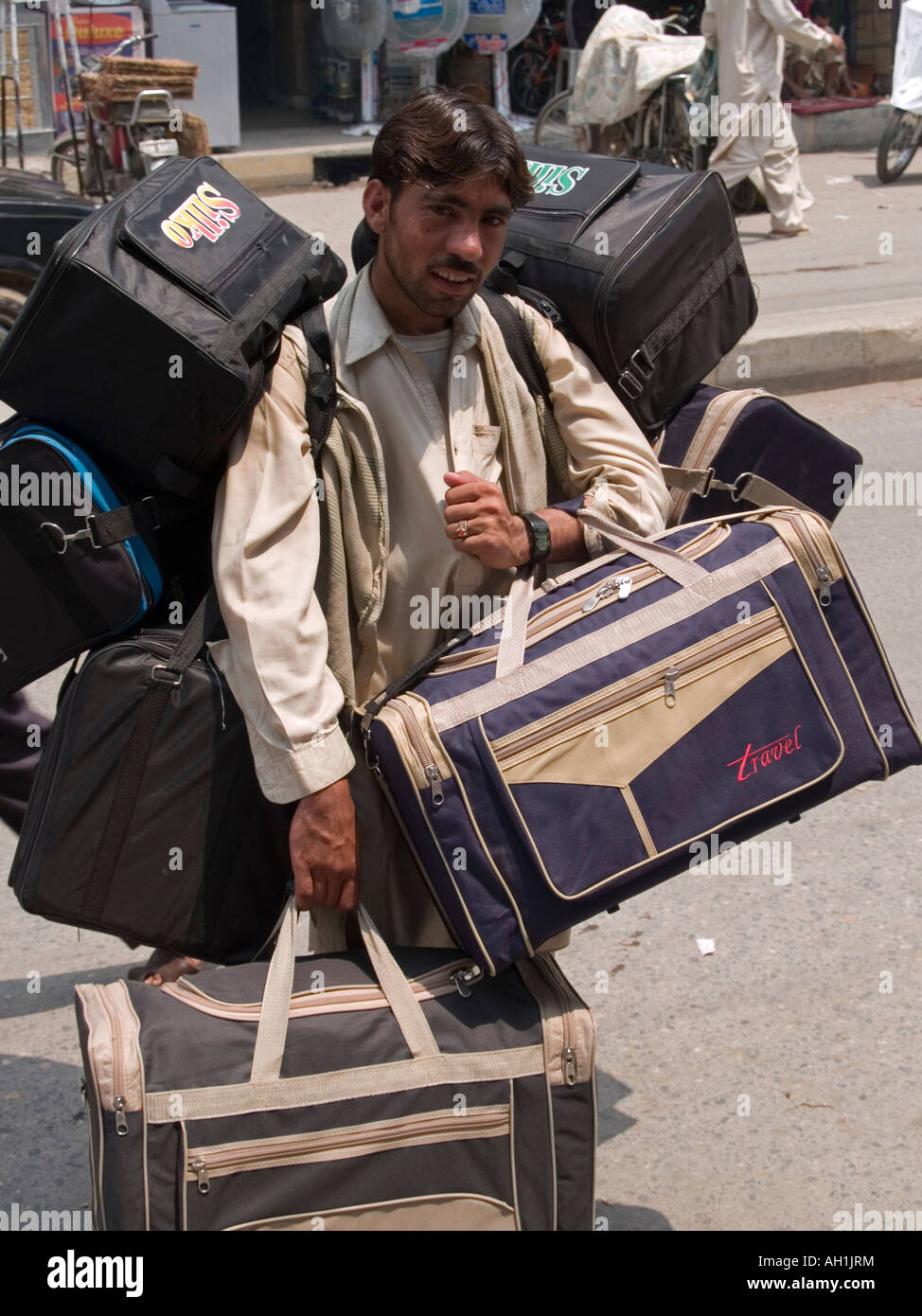 travelling bag salesman Rawalpindi bazaar Pakistan Stock Photo - Alamy