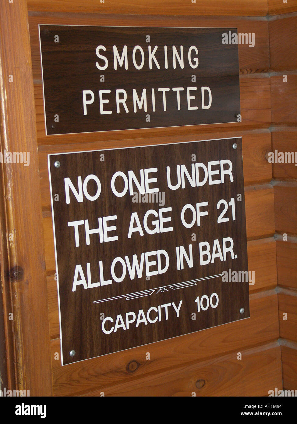 Signs on Bar Door Stock Photo - Alamy