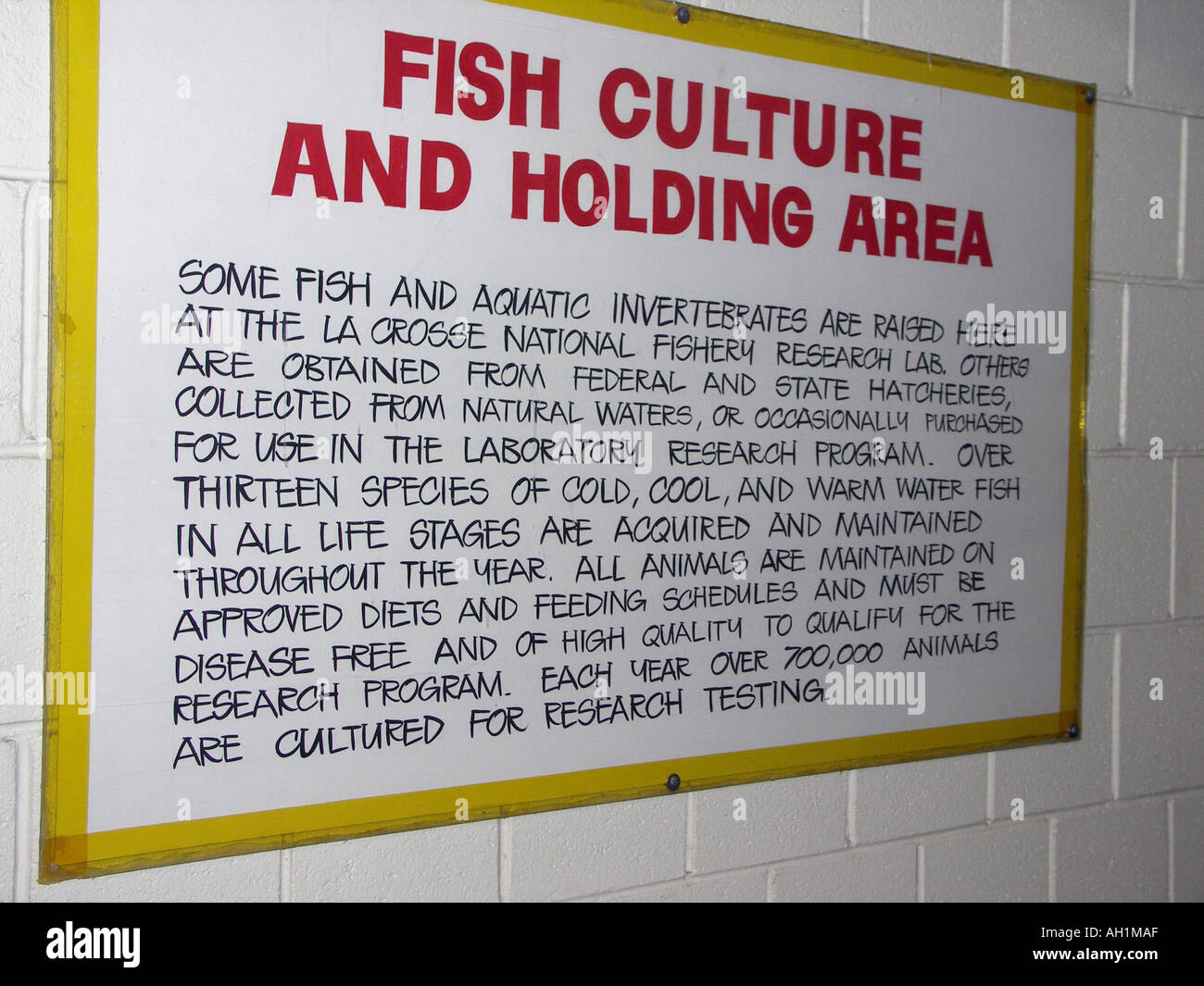 Sign on Wall of Fish Holding Area Stock Photo - Alamy
