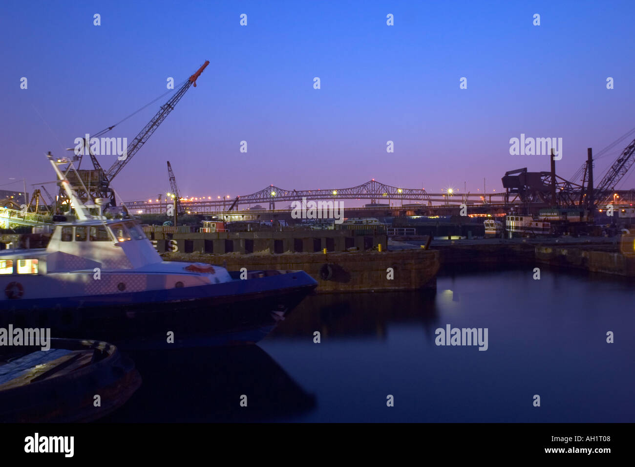 Boats at twilight in Quarterdeck Marine Corporation shipyard East ...