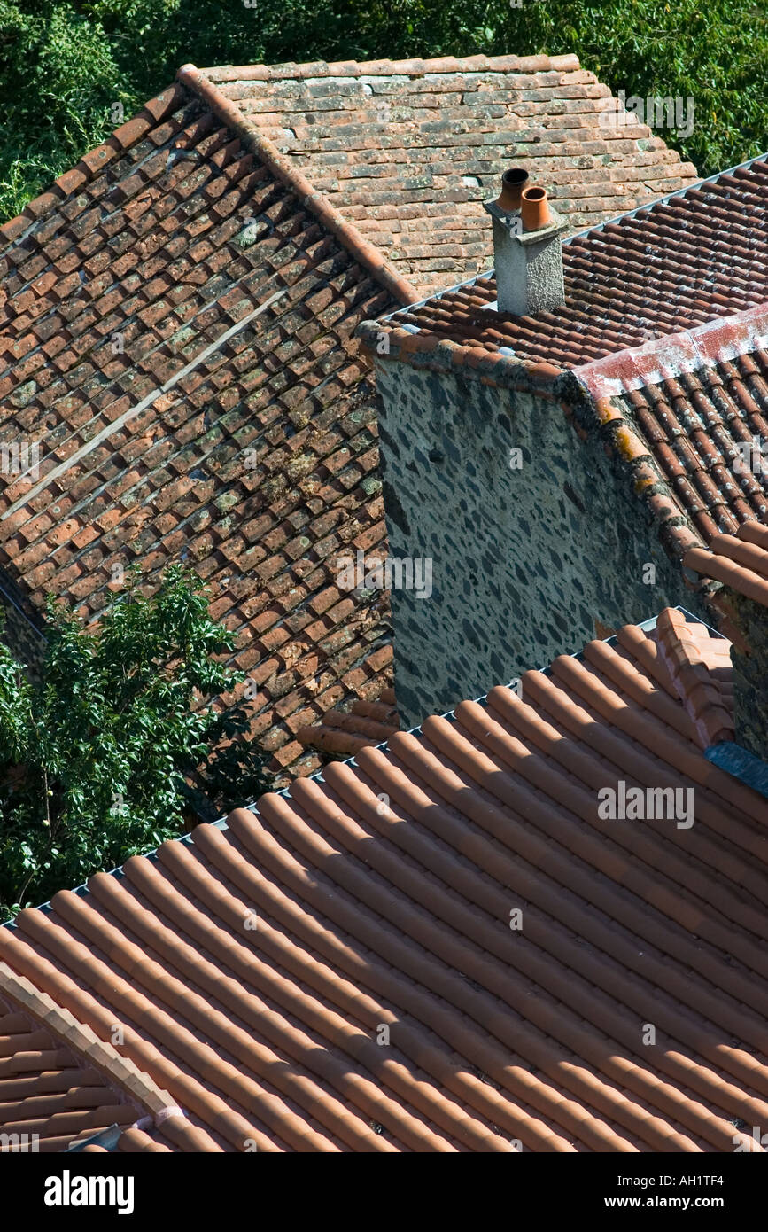 Roof pattern with red pan tiles and chimney Stock Photo - Alamy