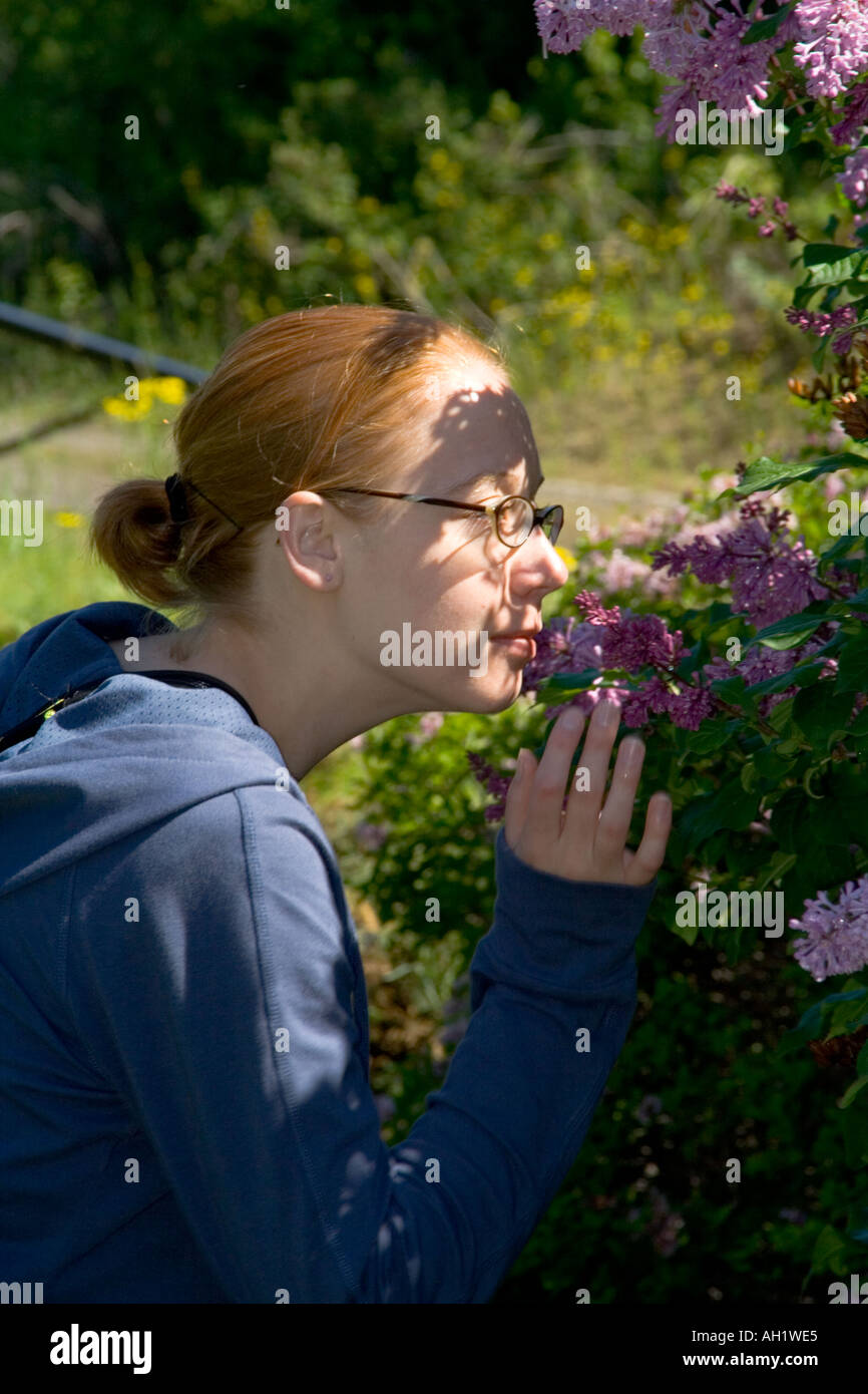 Lady Smells Flowers High Resolution Stock Photography and Images - Alamy