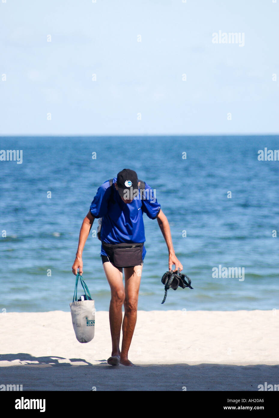 Caucasian man returning from a day of recreation at Fort Lauderdale ...