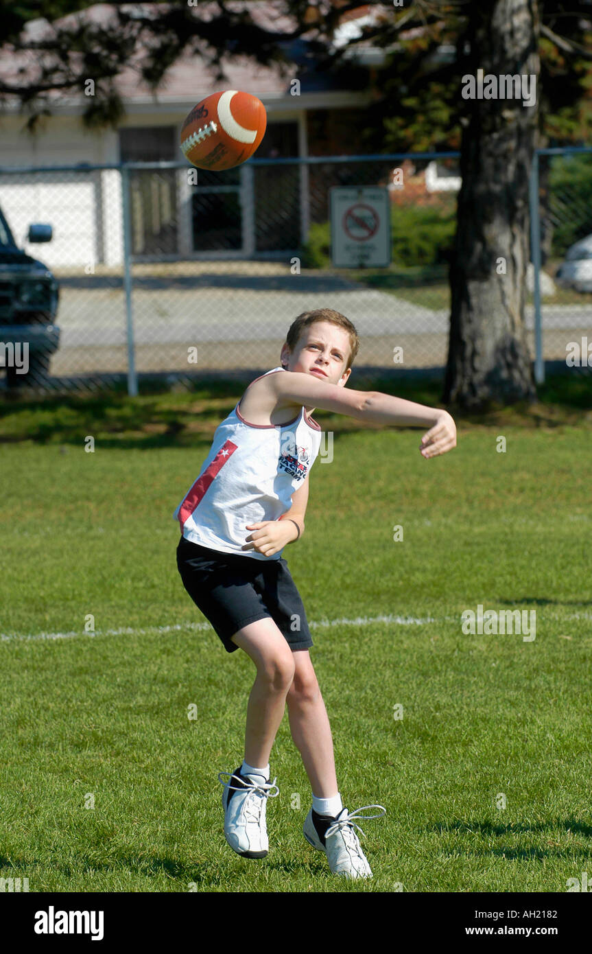 Boys Compete in Punt Pass Kick Competition Stock Photo - Alamy
