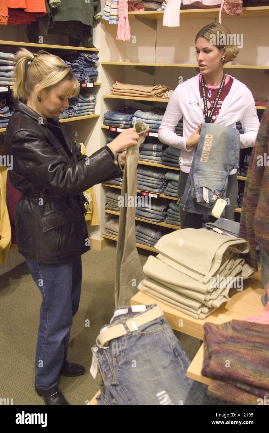 Adult Female Shops for New Clothing in Store Stock Photo - Alamy