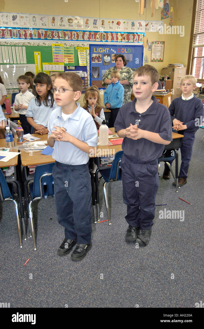 Children praying school catholic hi-res stock photography and images ...