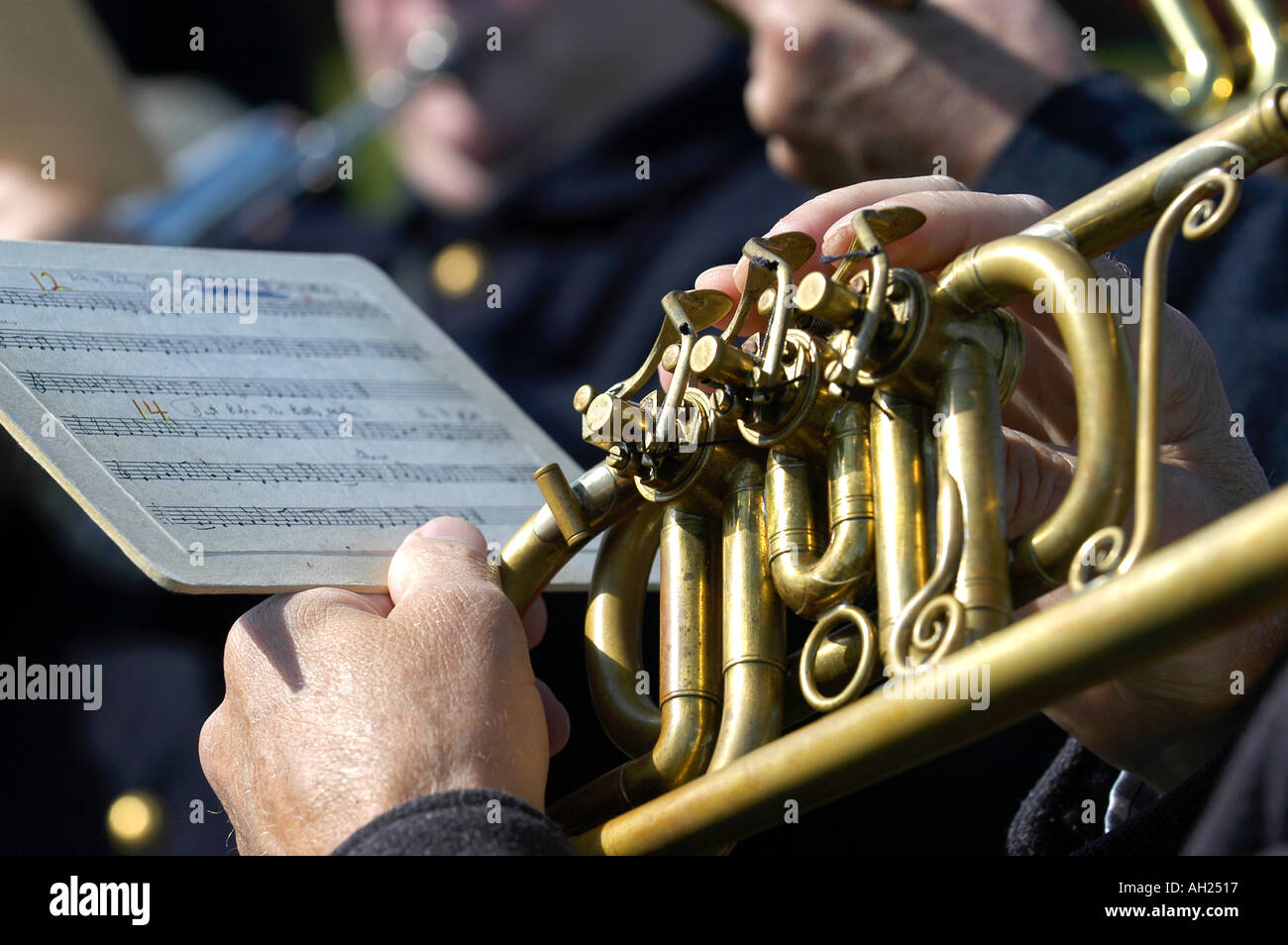 Hands on Trumpet Stock Photo - Alamy