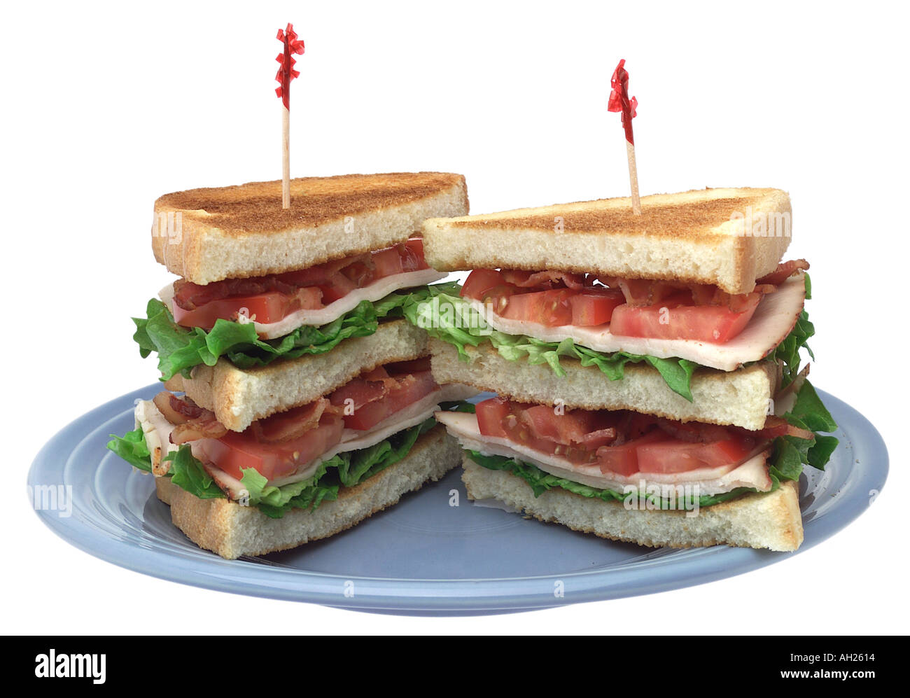 club sandwich on plate silhouetted on white background Stock Photo - Alamy