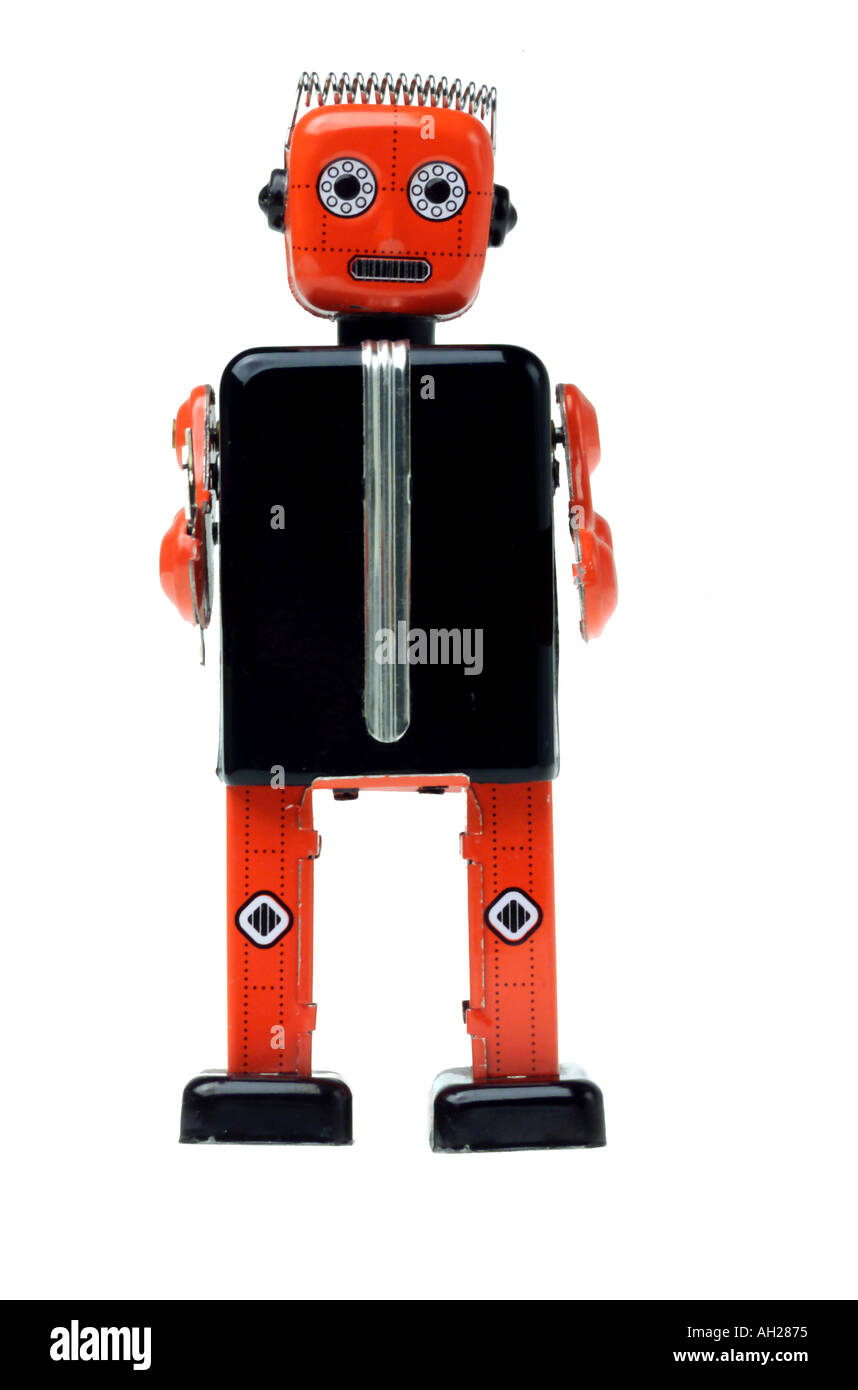 An antique toy metal robot silhouetted on white background Stock Photo ...