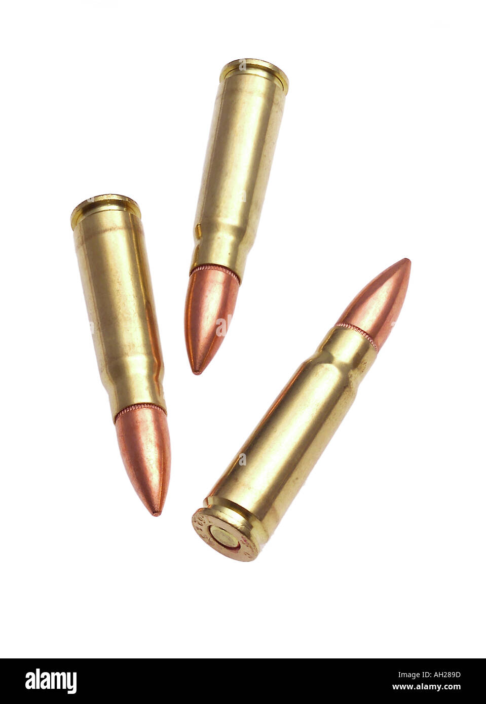 three bullets silhouetted on white background Stock Photo - Alamy