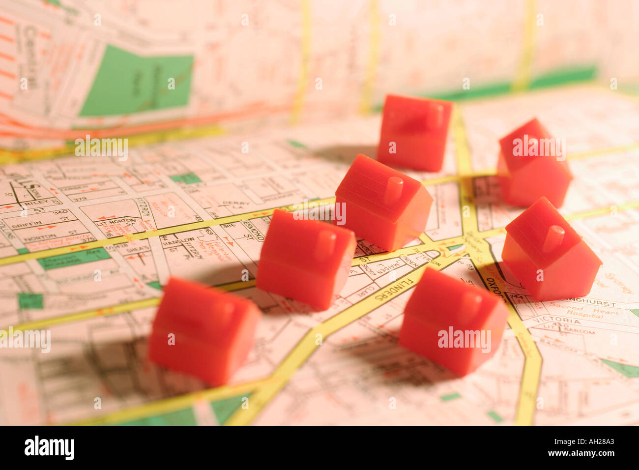 Miniature Houses on Street Map Stock Photo - Alamy