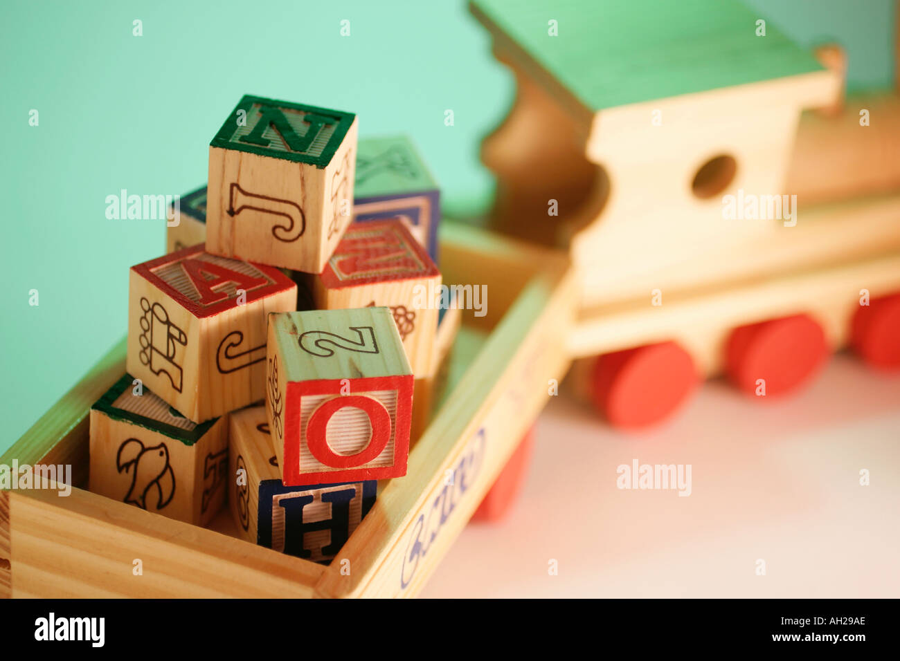 Alphabet Cubes on Wooden Toy Train Stock Photo - Alamy