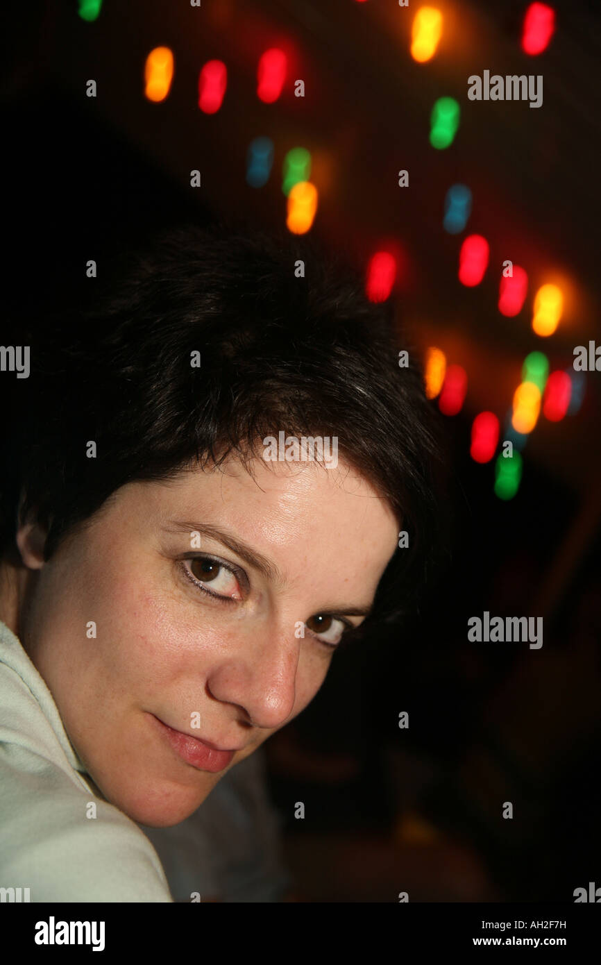 Portrait woman blurred lights behind hi-res stock photography and ...