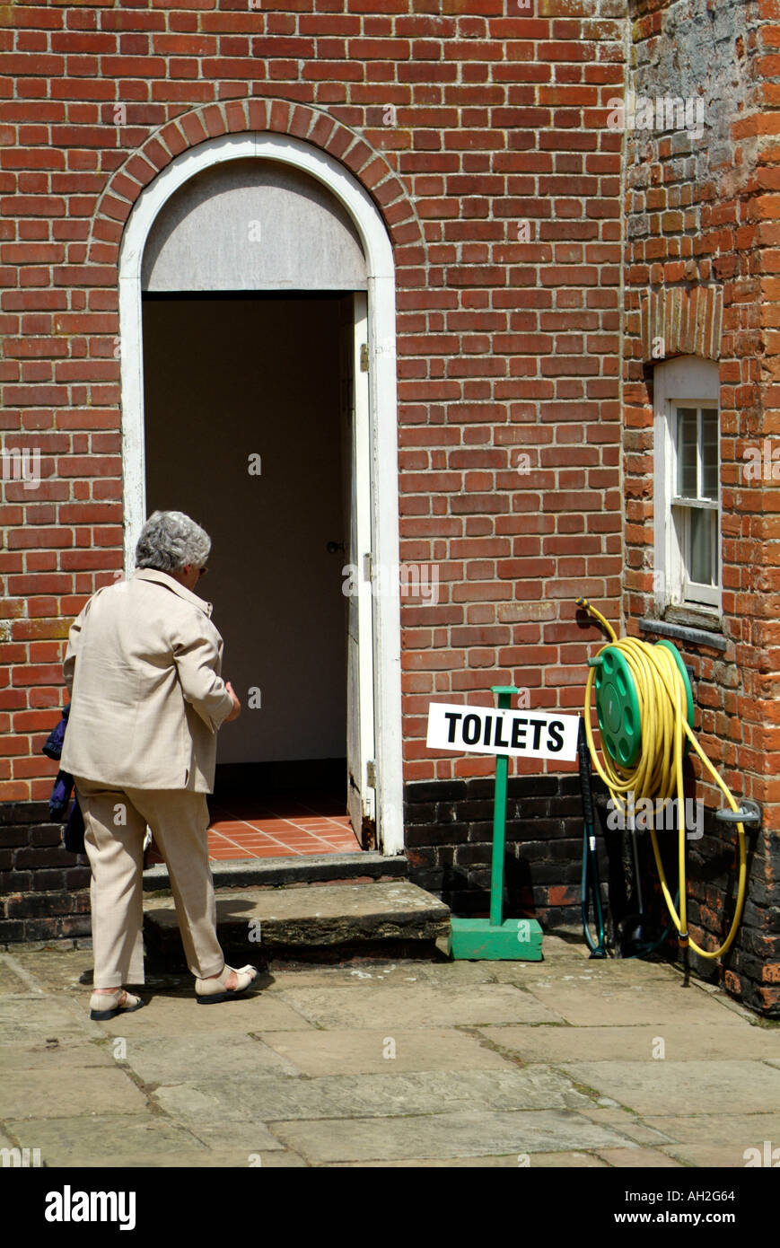women entering public toilet Stock Photo - Alamy