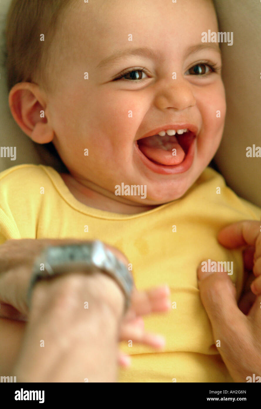 Baby boy being tickled hi-res stock photography and images - Alamy