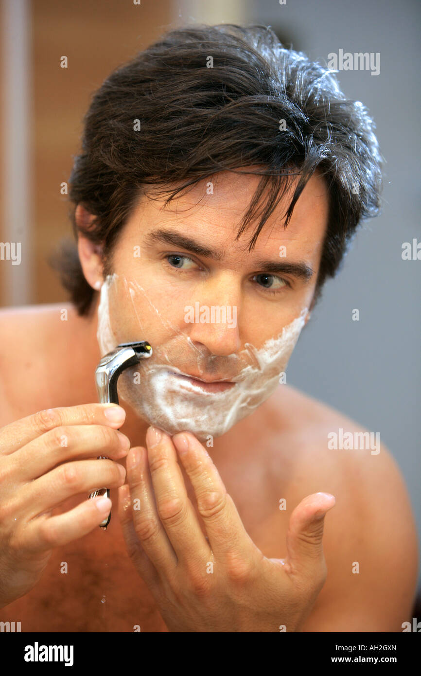 Man shaving, portrait Stock Photo - Alamy