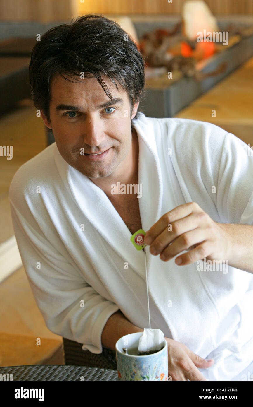 man relaxing at wellness hotel Stock Photo - Alamy