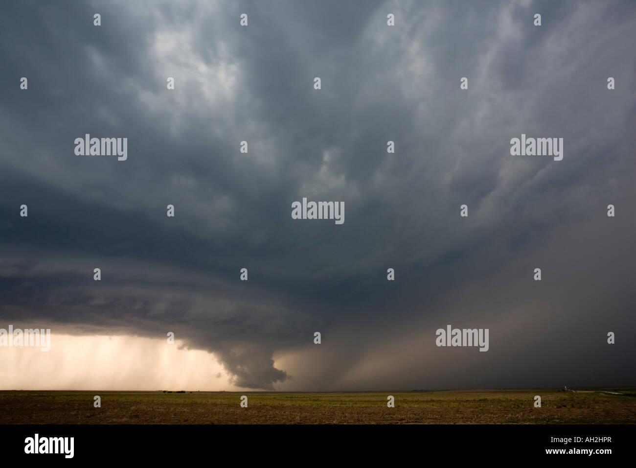 A beautiful supercell thunderstorm with a wallcloud beneath it in ...
