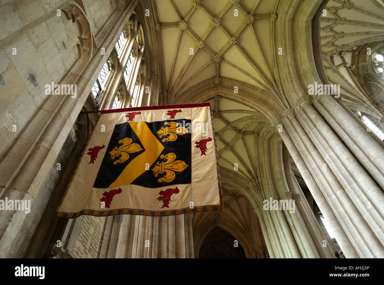 Heraldic flag hanging in Winchester cathedral, Hampshire UK Stock Photo ...