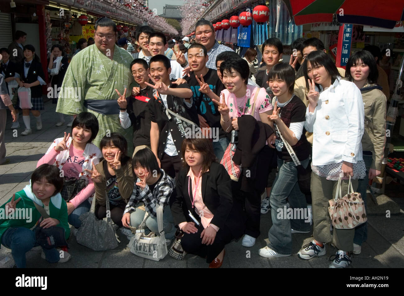 off duty sumo wrestler posing with school children Tokyo City Honshu ...