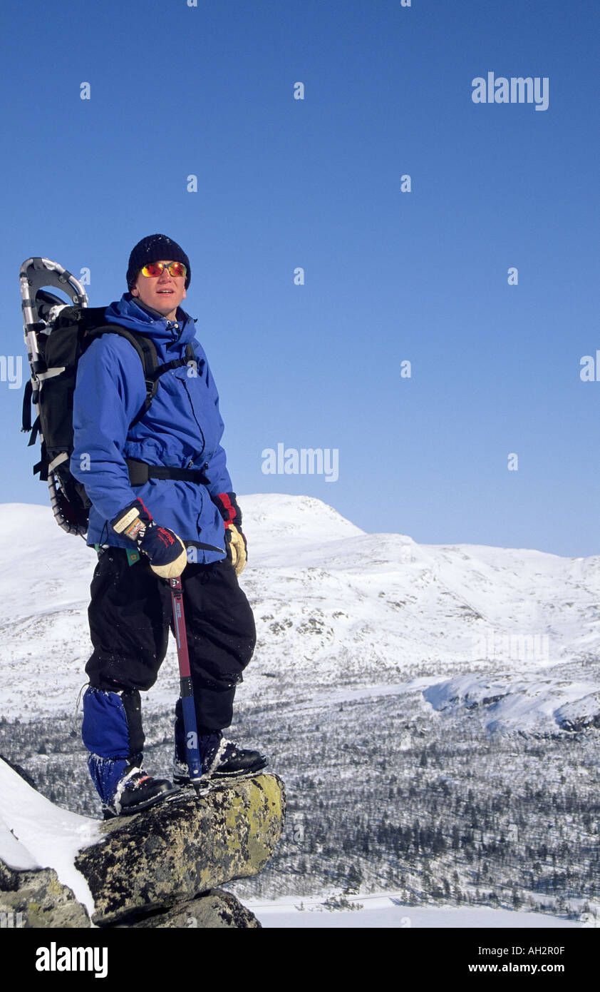 Climber standing at viewpoint Stock Photo - Alamy