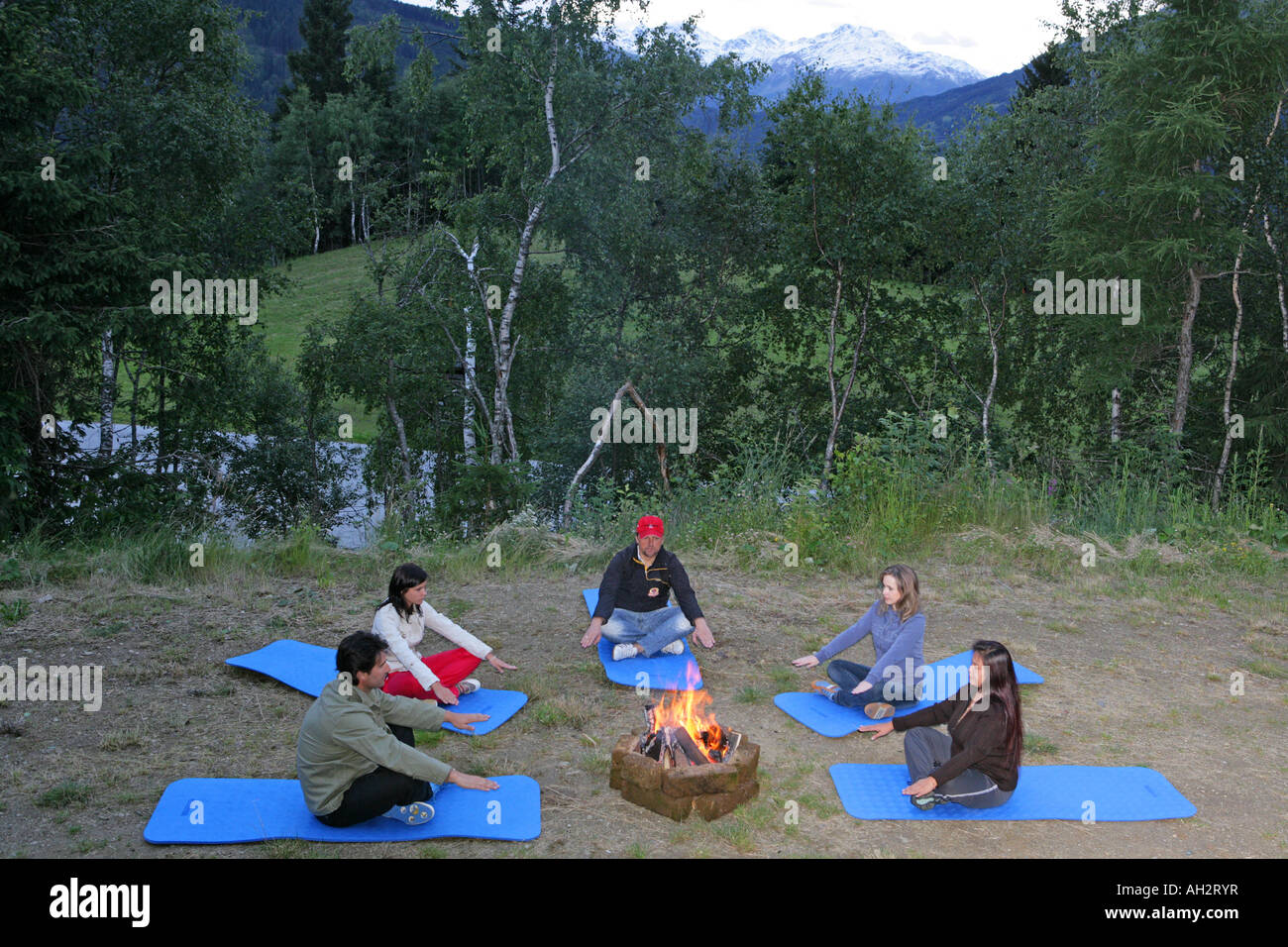 people doing vedische fire meditation Stock Photo - Alamy