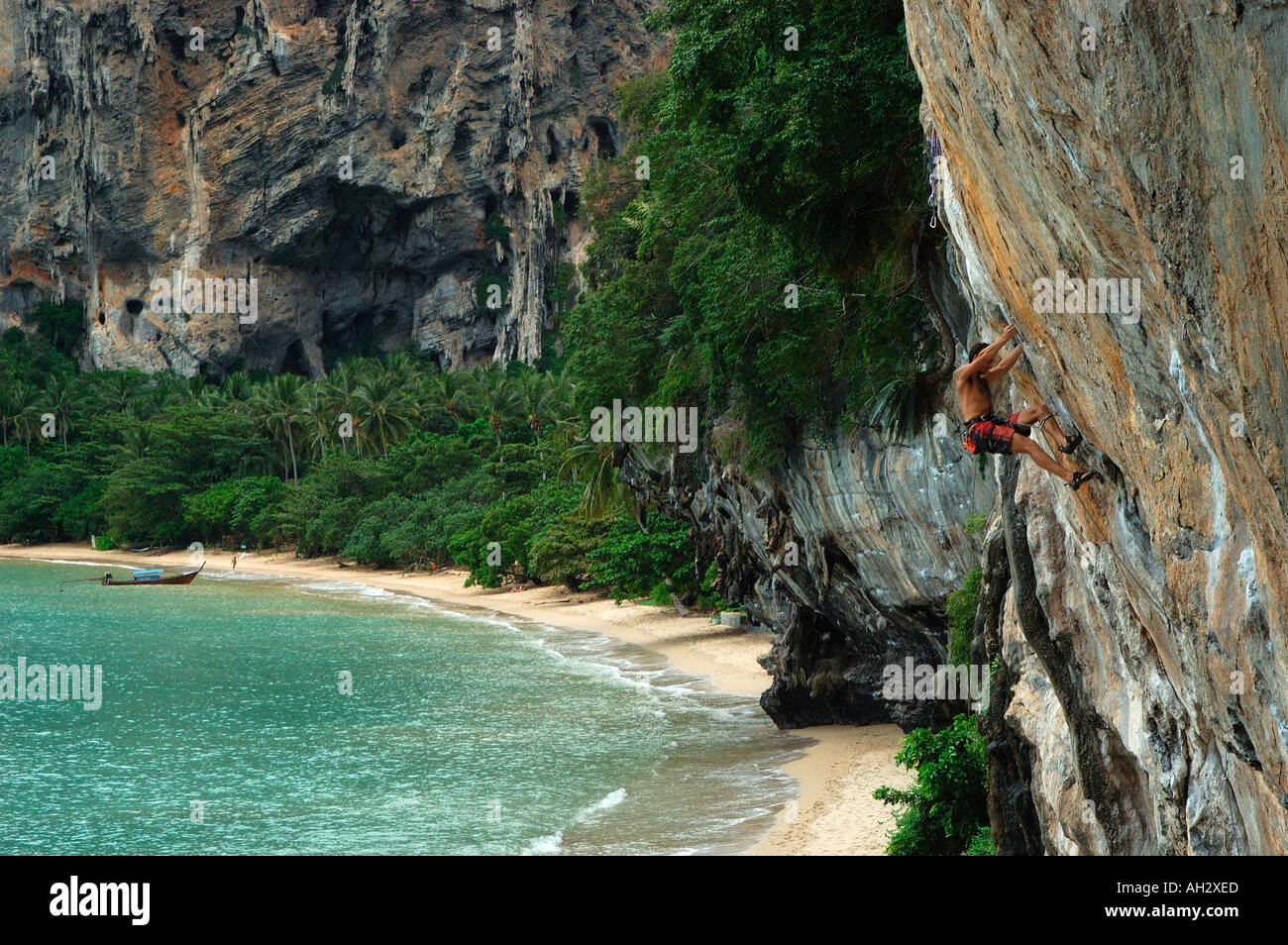 Foreign tourist climbing rock hi-res stock photography and images - Alamy
