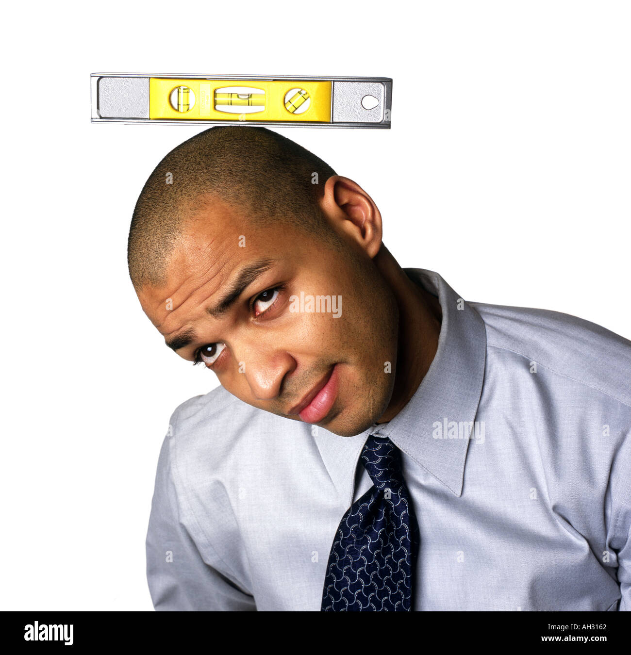 African American Man with level on head Stock Photo - Alamy