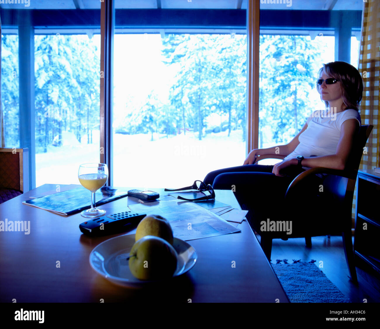 Young woman in motel room Stock Photo - Alamy