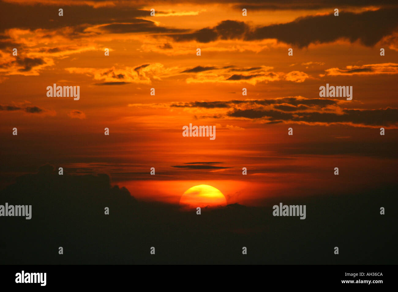 Thai sunset over Phuket holiday resort Stock Photo - Alamy