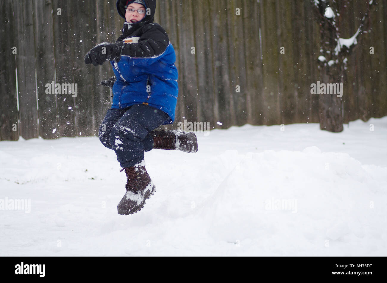 A boy in snow Stock Photo - Alamy