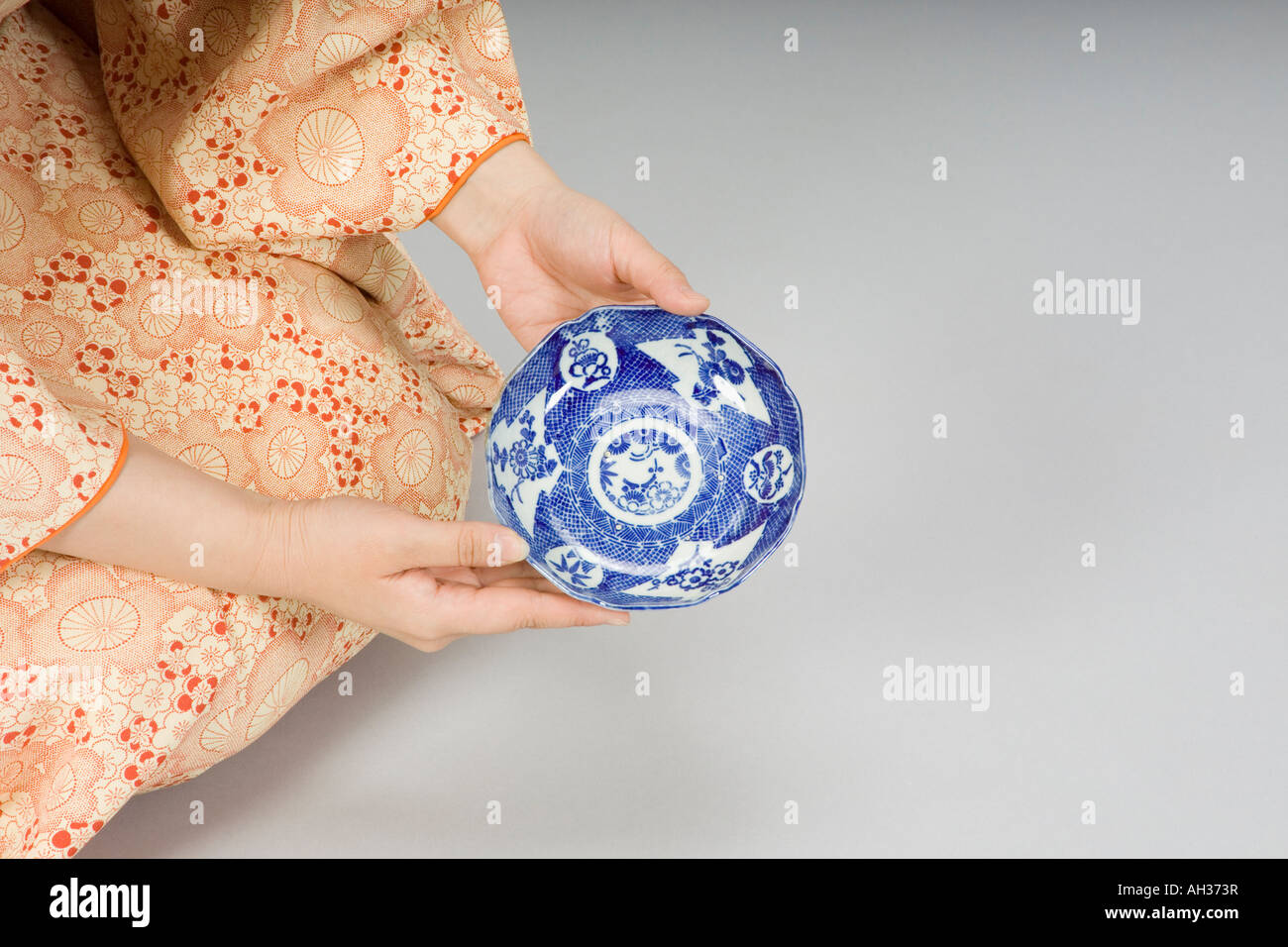 Woman examining plate Stock Photo - Alamy Woman examining plate Stock Photo - Alamy