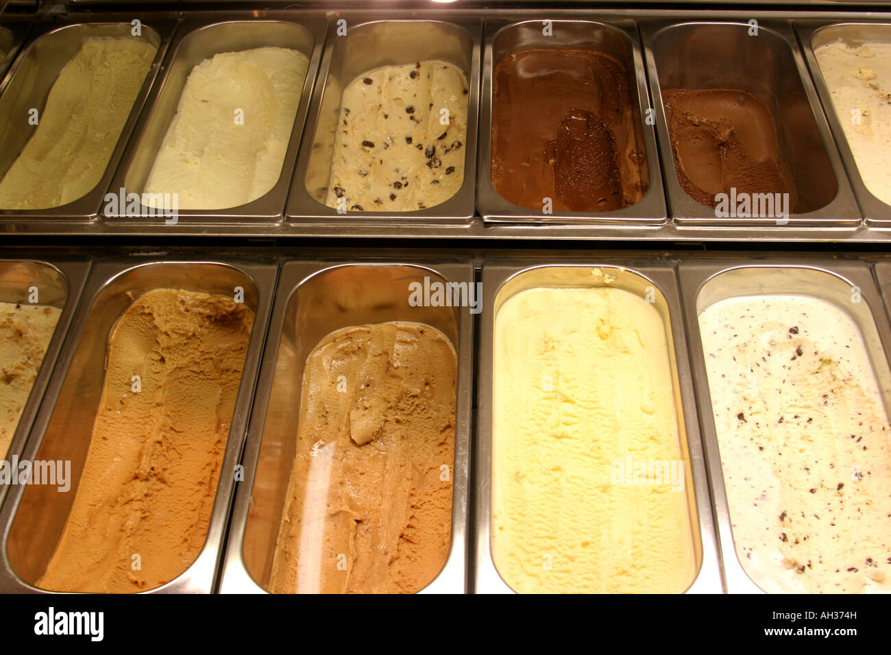 Multiple flavors of ice cream on display at an ice cream shop Stock ...