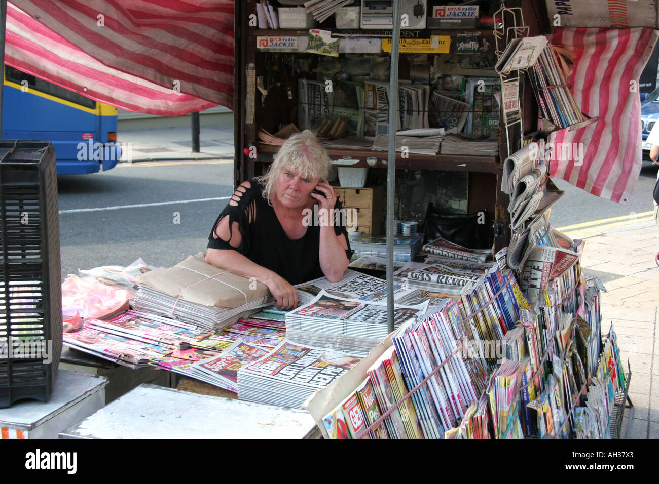 Newspaper vendor train hi-res stock photography and images - Alamy