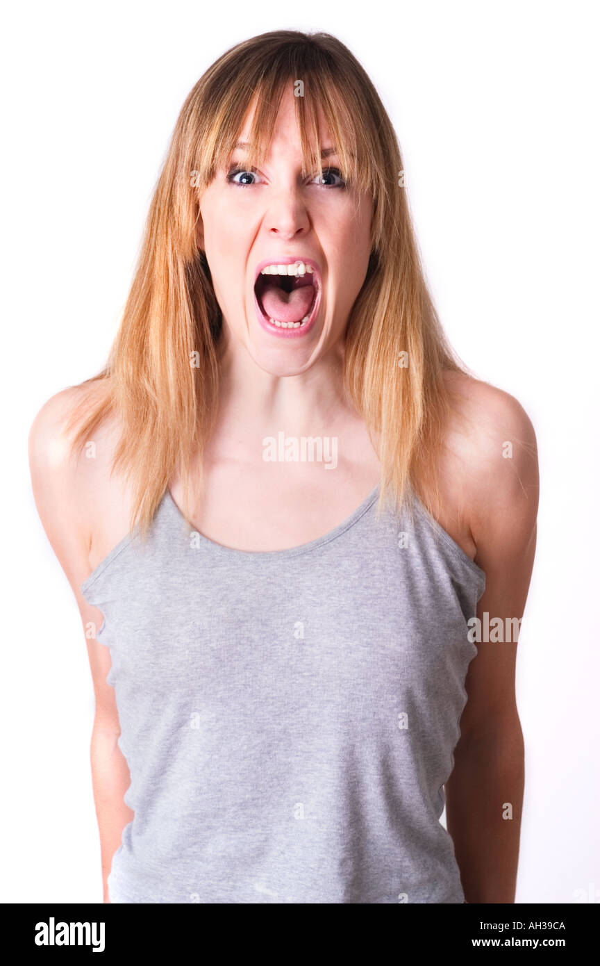 Young woman shouting Stock Photo - Alamy
