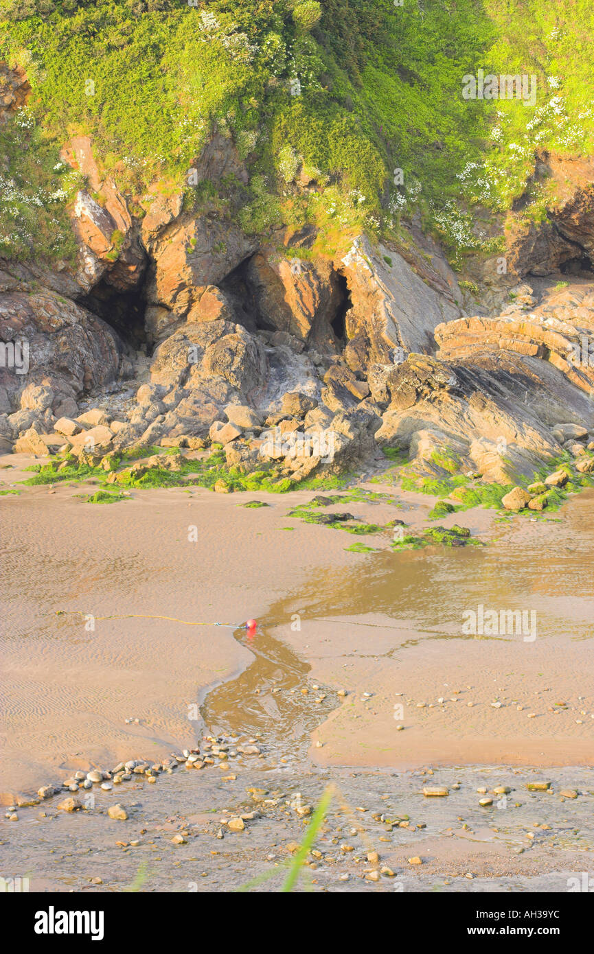Red float on Little Haven beach Stock Photo - Alamy