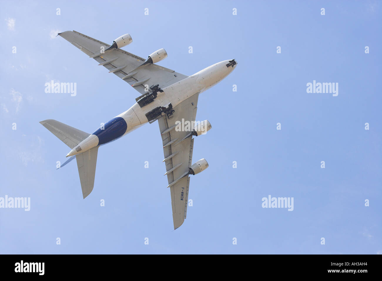 Airbus A380 from underneath climbing away at Farnborough Stock Photo ...
