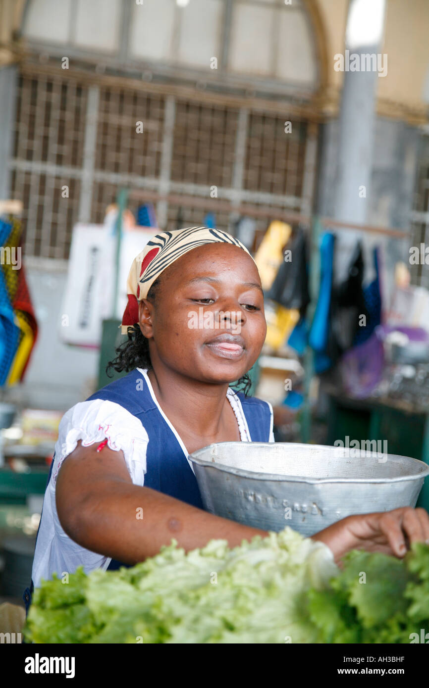 African black woman selling fresh green vegetables at Maputo Central ...