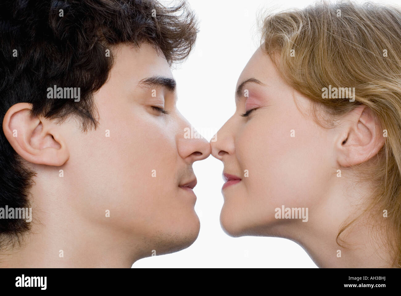 Couple face face touching noses hi-res stock photography and images - Alamy
