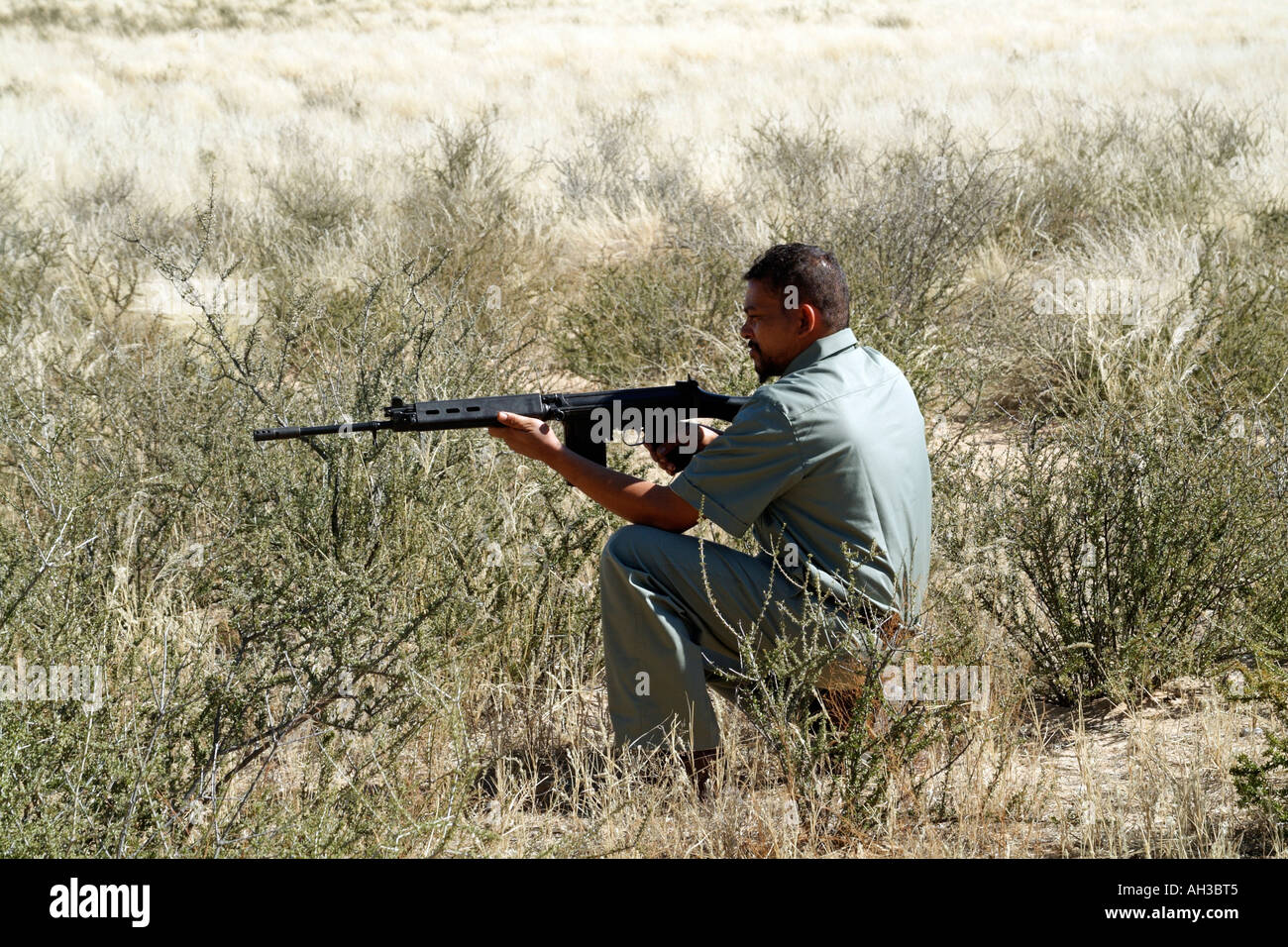 Armed game ranger. Kalahari Transfrontier national Park South Africa ...